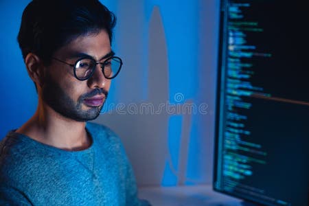 Indian Software Development Working on Coding Computer Screen and Flowchart at Night in Modern ...