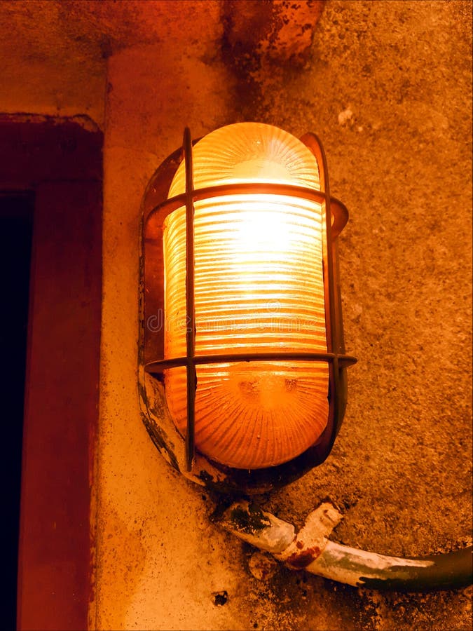 Indian Street Light with Metal Guard on the Wall Stock Photo - Image of ...