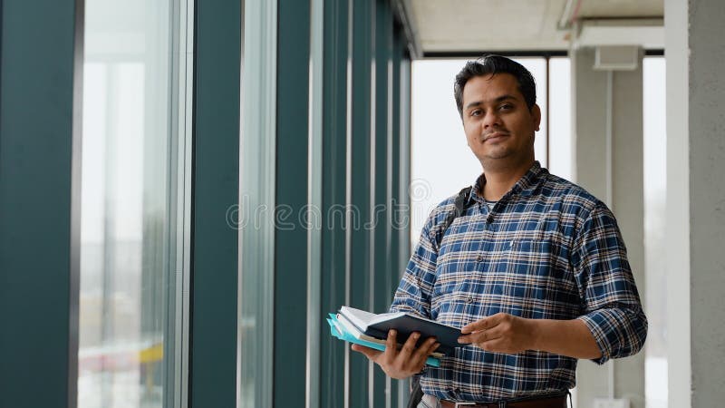 Indian Student Reading Book at University is Preparing for the Exam ...