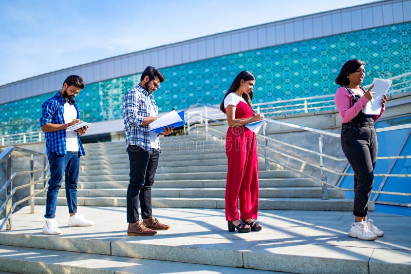Indian Students Keeping Distance and Do Home Work Outdoors Stock Image ...