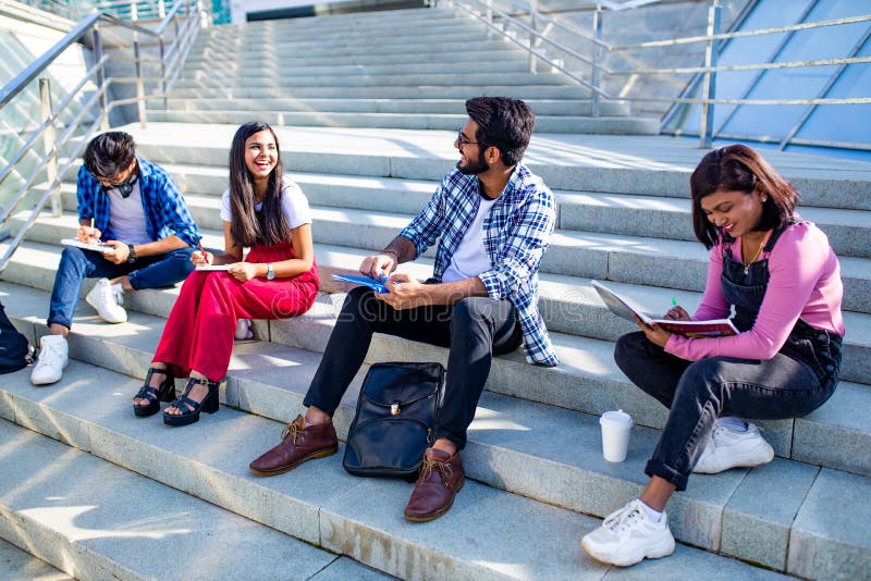 Indian Students Keeping Distance and Do Home Work Outdoors Stock Image ...