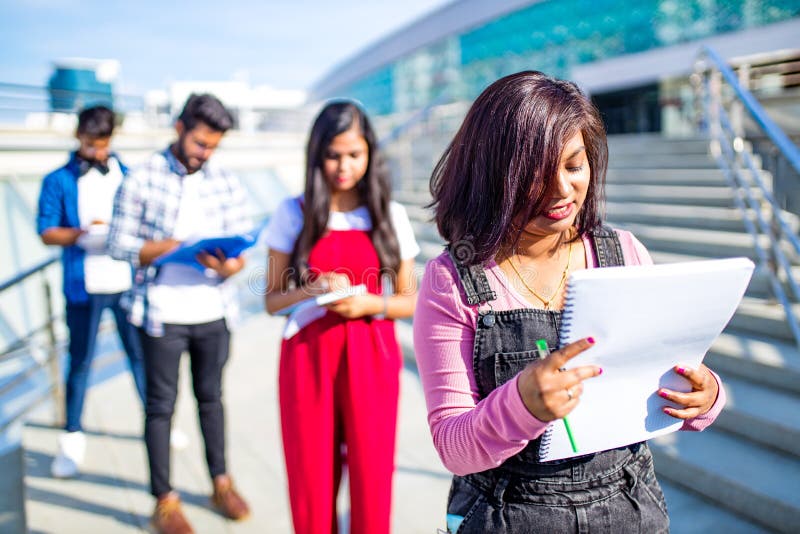 Indian Students Keeping Distance and Do Home Work Outdoors Stock Image ...