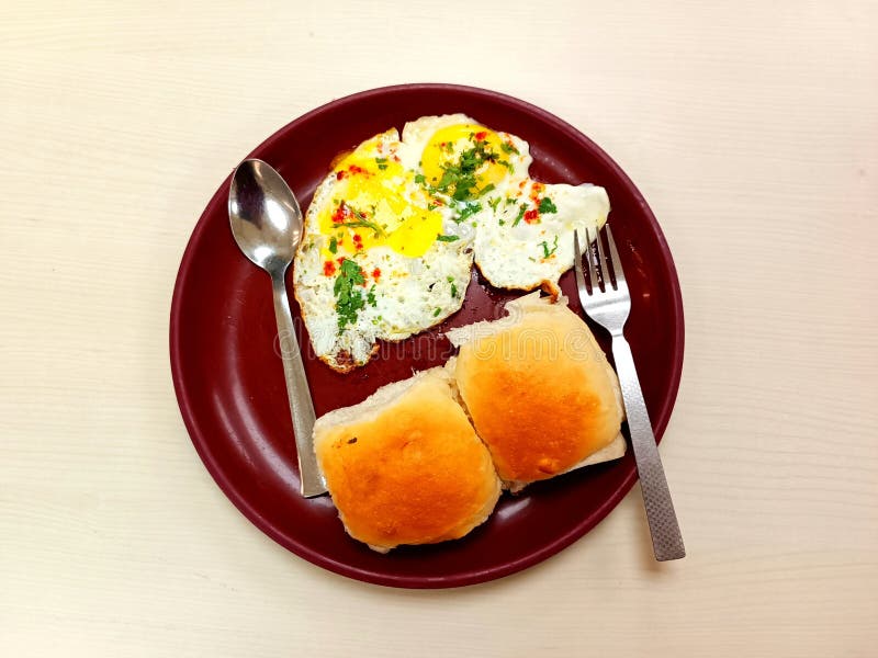 Indian Style Spicy Egg Half Fry with Bread-2 Stock Photo - Image of ...