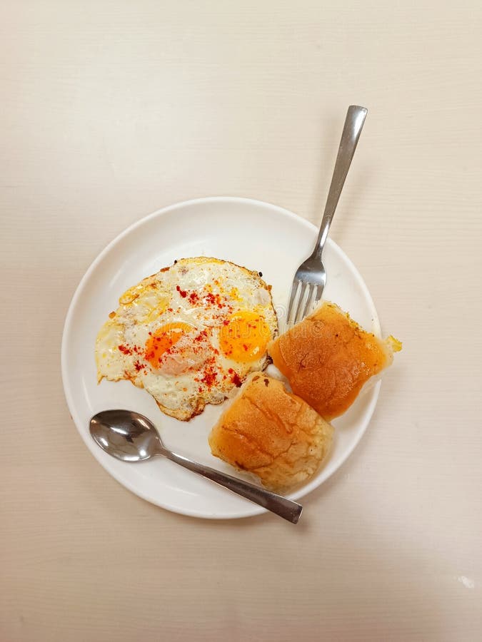 Indian Style Spicy Egg Half Fry with Bread-3 Stock Photo - Image of ...