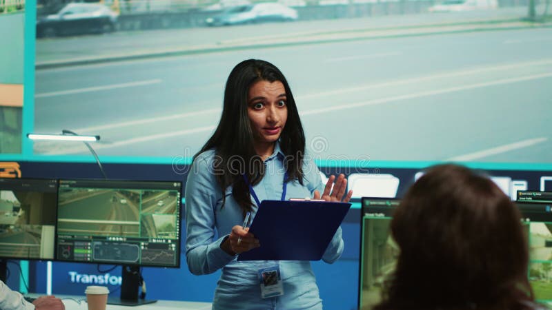 Indian Supervisor Assigning Tasks for Her Operators Team in Observation ...