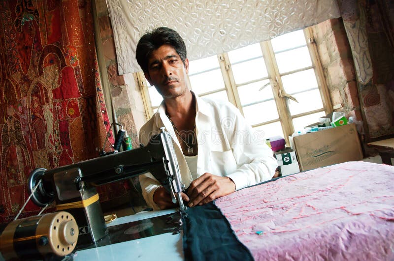 Indian tailor at work editorial photo. Image of common - 70999866