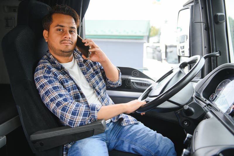 Indian Truck Driver Tending a Client on the Phone. Stock Image - Image ...