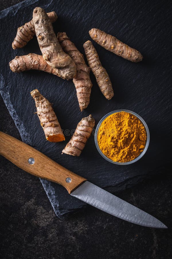 Indian Turmeric Powder and Root. Turmeric Spice Stock Photo - Image of ...