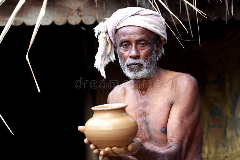 Indian Village Potter stock photo. Image of pottery, hand - 16739222