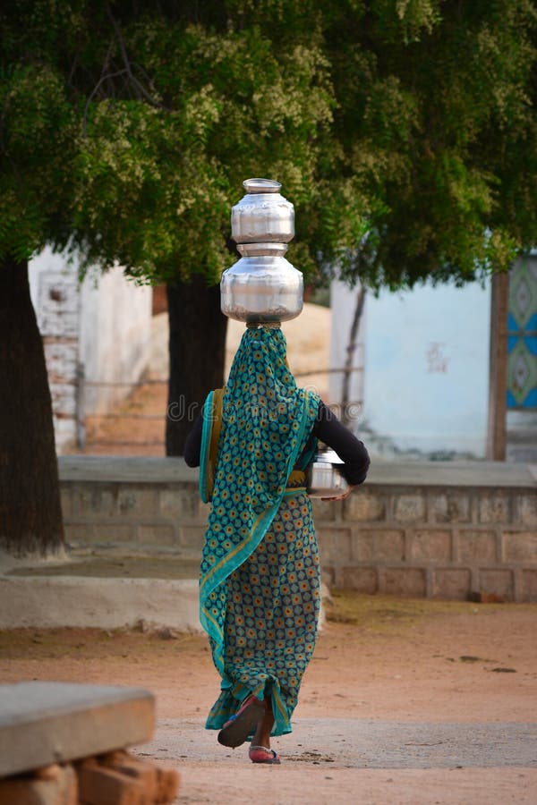 185 Woman Carrying Pot Head Images Stock Photos - Free & Royalty-Free ...