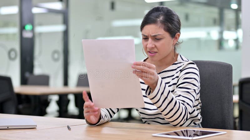 Indian Woman Feeling Shocked while Reading Documents Stock Photo ...