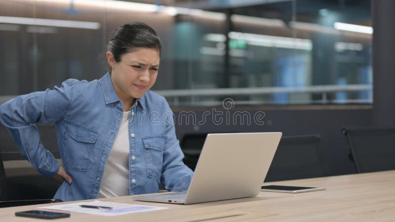 Indian Woman Having Back Pain while Using Laptop Stock Photo - Image of ...
