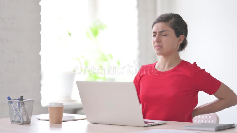 Indian Woman Having Back Pain while Using Laptop in Office Stock Image ...
