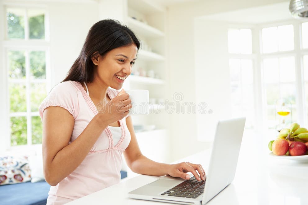 Indian Woman Using Laptop at Home Stock Photo - Image of technology ...