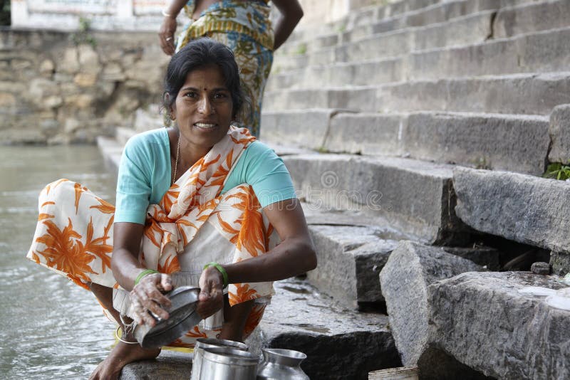 Indian Woman In Sari Washing Clothes In The River Editorial Photo