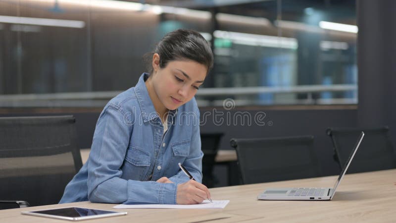 Indian Woman Writing on Paper at Work Stock Photo - Image of document ...