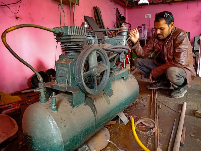 An Indian Worker Holded Machine Panel at Workshop in India January 2020 ...