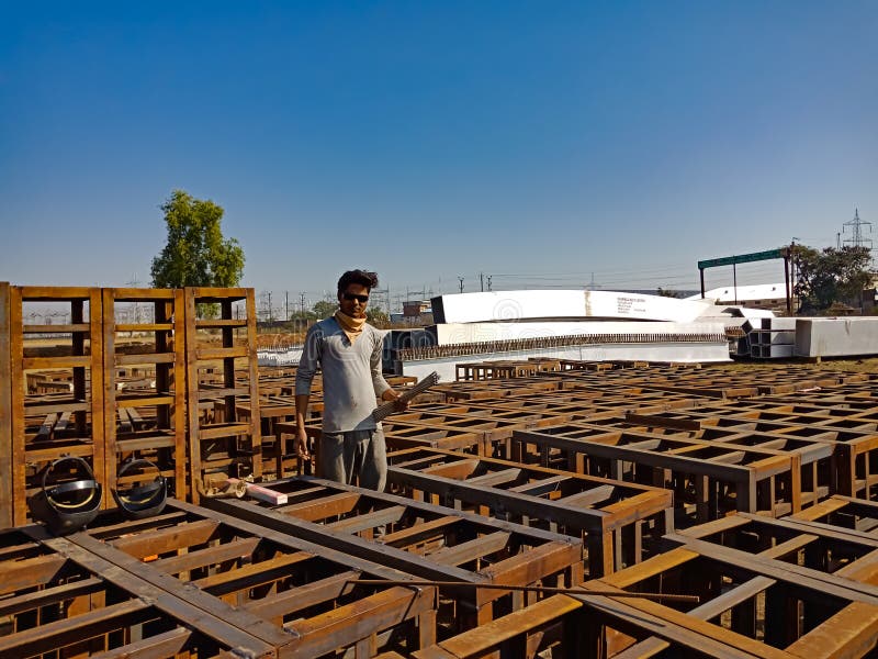 An Indian Worker Making Iron Structure during Railway Bridge ...