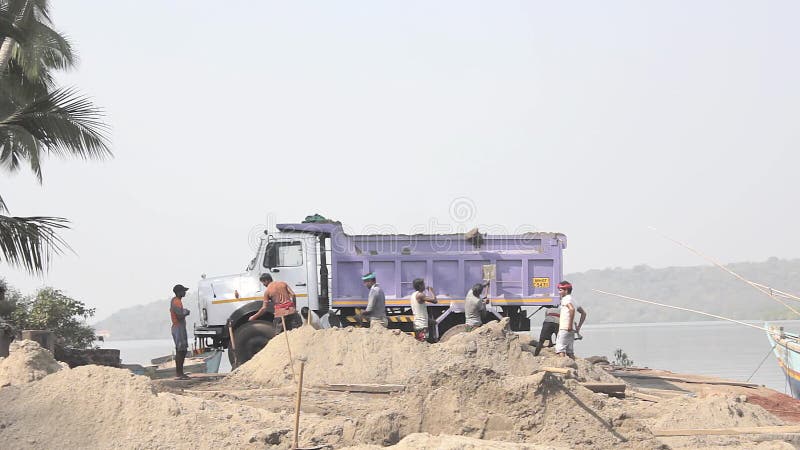 Indian Truck Mechanic Working To Fix the Tractor. Semi Truck Under Maintenance Stock Footage ...