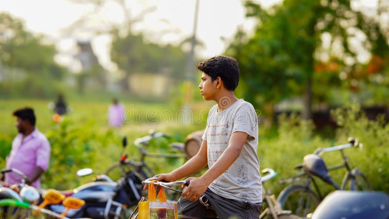 Indian young boy in market editorial image. Image of april - 256131685