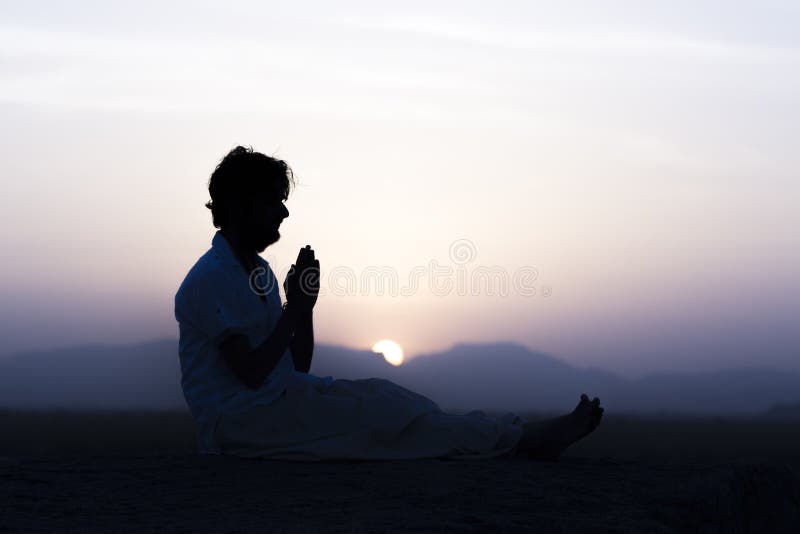 Indian Young Man Practicing Yoga on the Mountain at Blue Sunset Stock ...