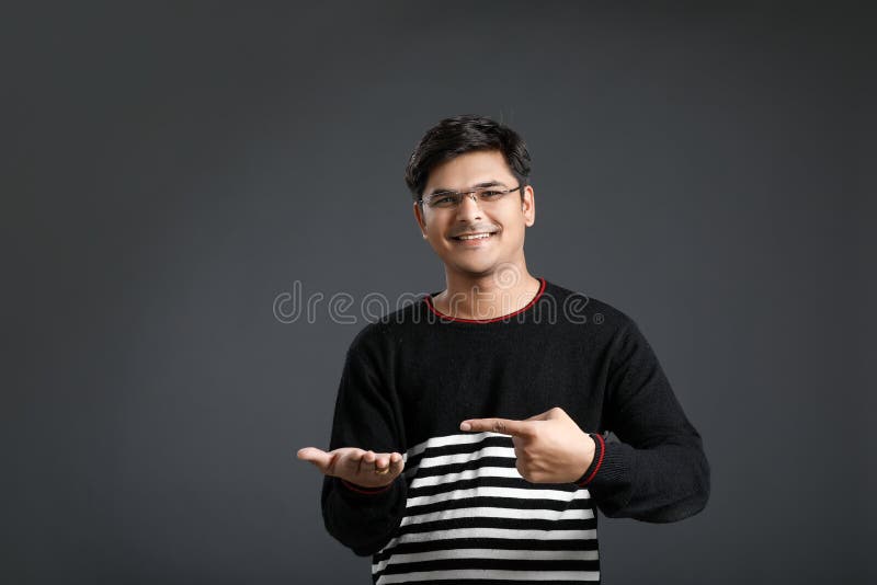 Indian Young Man Showing Direction with Hand Stock Photo - Image of ...