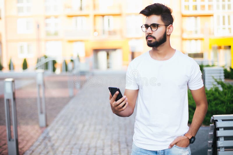 Indian Man Using Mobile Phone Waving Hand, Communication Online on the ...