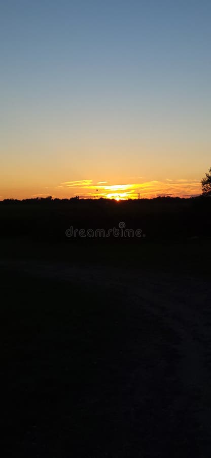 Indiana sunset glow stock photo. Image of reflection - 269161000