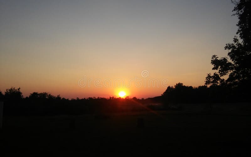 Indiana sunset stock photo. Image of fall, western, field - 100615420