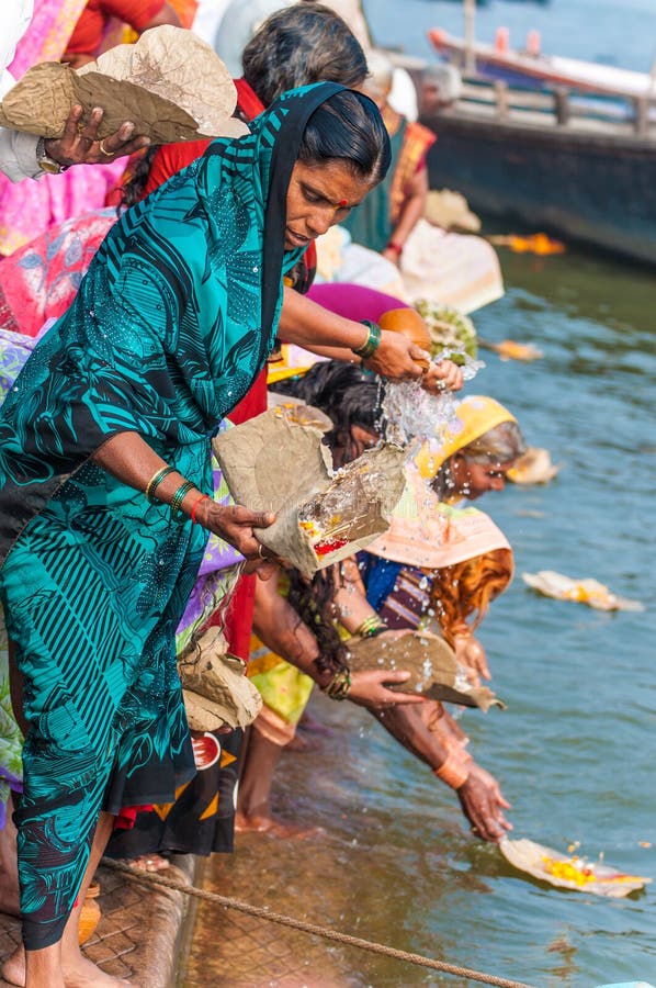 Indian People Wash Themselves in the River Ganges Editorial Photography ...