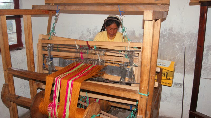 Indigenous Lady Working with Her Handmade Knitting Machine in Her ...