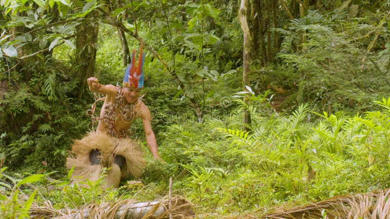 Indigenous Warrior Following the Viewer in the Amazon Jungle Stock ...