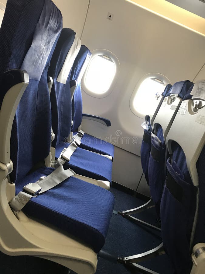 Empty flight seats stock photo. Image of flight, seat - 124114816