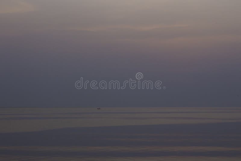 Indigo Sea with an Orange Sky at Dawn Stock Image - Image of water ...
