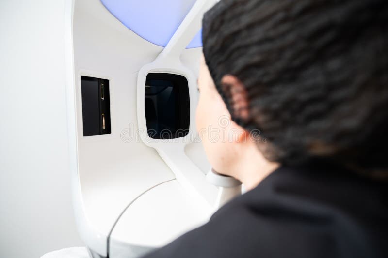 Person Interacting with Advanced Technology in a Modern Setting Stock ...