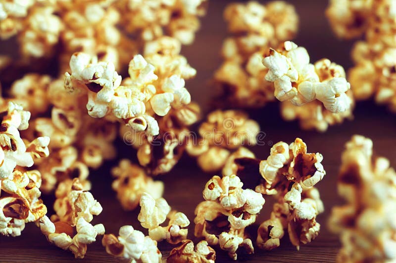 Individual Golden Flakes of Delicious Popcorn Scattered on Table. Stock ...