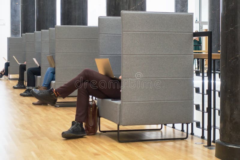 Individual Reading or Working Place in Library. People Sitting and ...