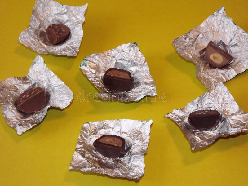 Individual Silver Wrapped Chocolates with Different Fillings in a Box ...