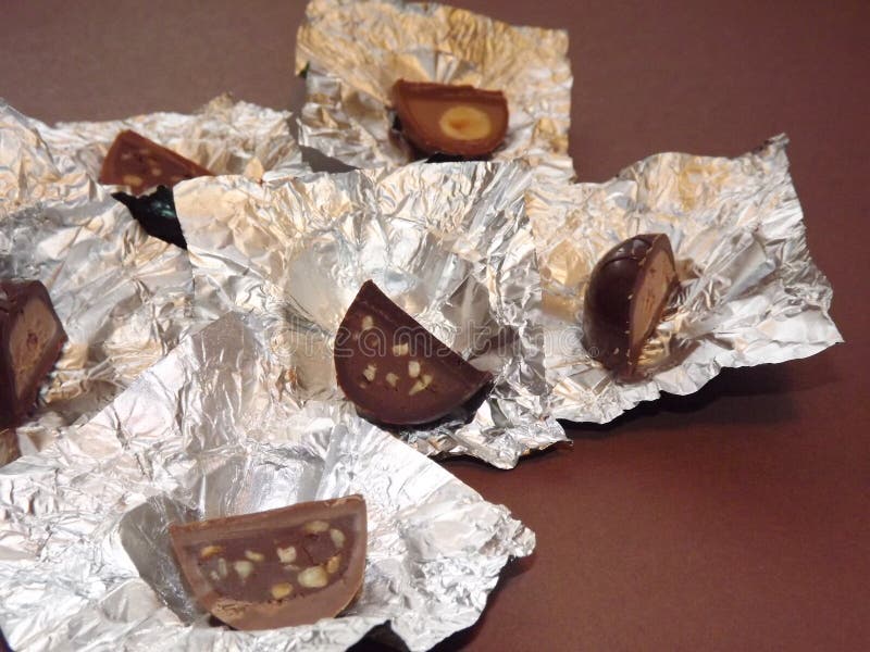 Individual Silver Wrapped Chocolates with Different Fillings in a Box ...