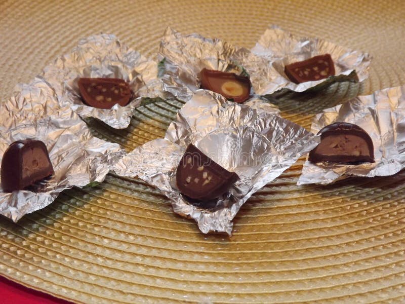 Individual Silver Wrapped Chocolates with Different Fillings in a Box ...