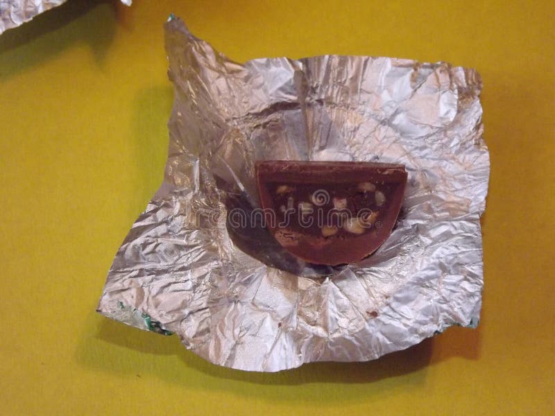 Individual Silver Wrapped Chocolates with Different Fillings in a Box ...