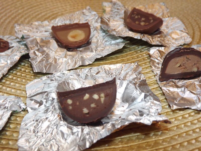 Individual Silver Wrapped Chocolates with Different Fillings in a Box ...