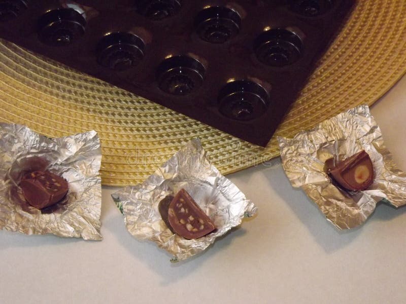 Individual Silver Wrapped Chocolates with Different Fillings in a Box ...