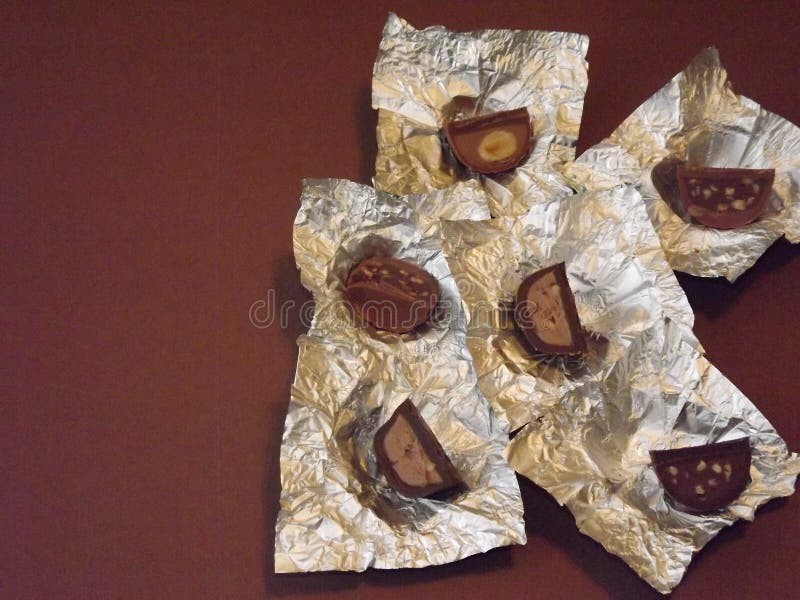 Individual Silver Wrapped Chocolates with Different Fillings in a Box ...