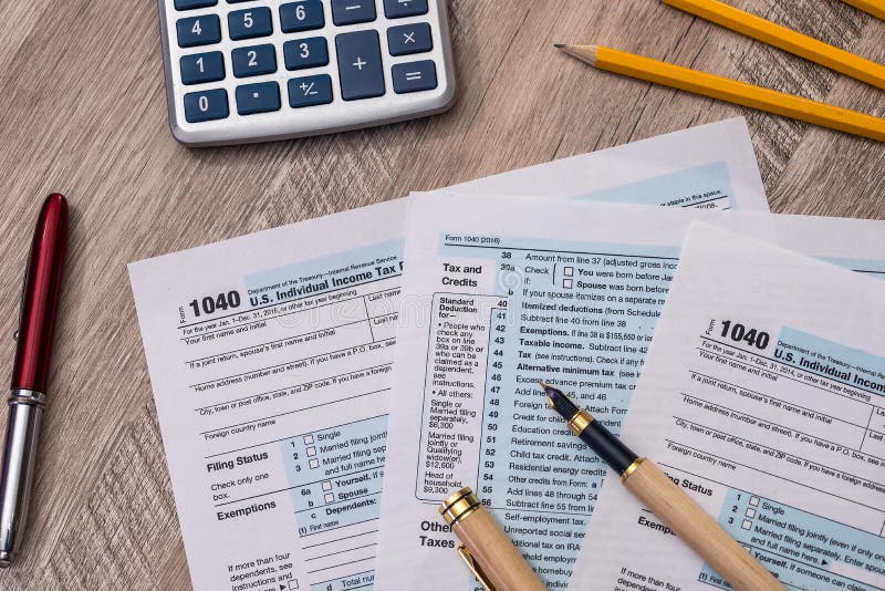 Individual Tax Form with Calculator, Pen and Pencil Editorial Image ...