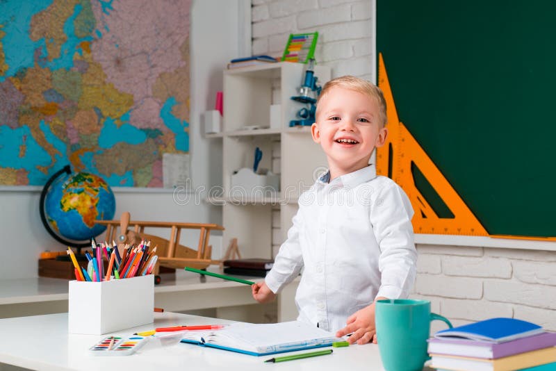 Individual Teaching. Cute Little Preschool Kid Boy with Teacher Study ...