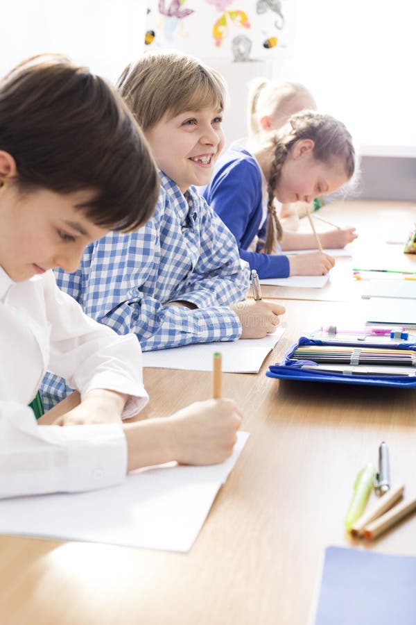 Individual work at school stock photo. Image of smile - 72609734