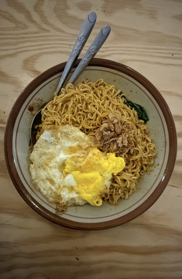 Indomie Rendang Instant Noodles with Fried Eggs Stock Photo - Image of ...