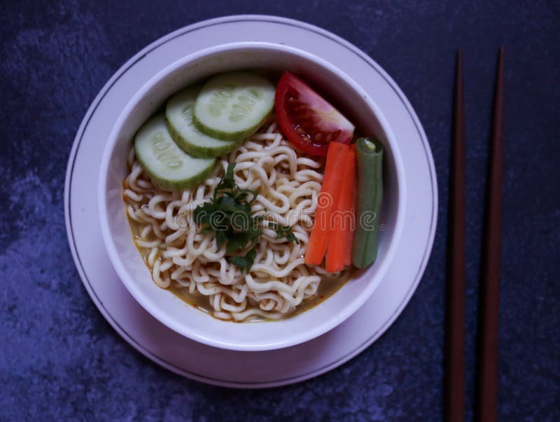 Indomie Special with Fish Eggs and Vegetables Stock Image - Image of ...