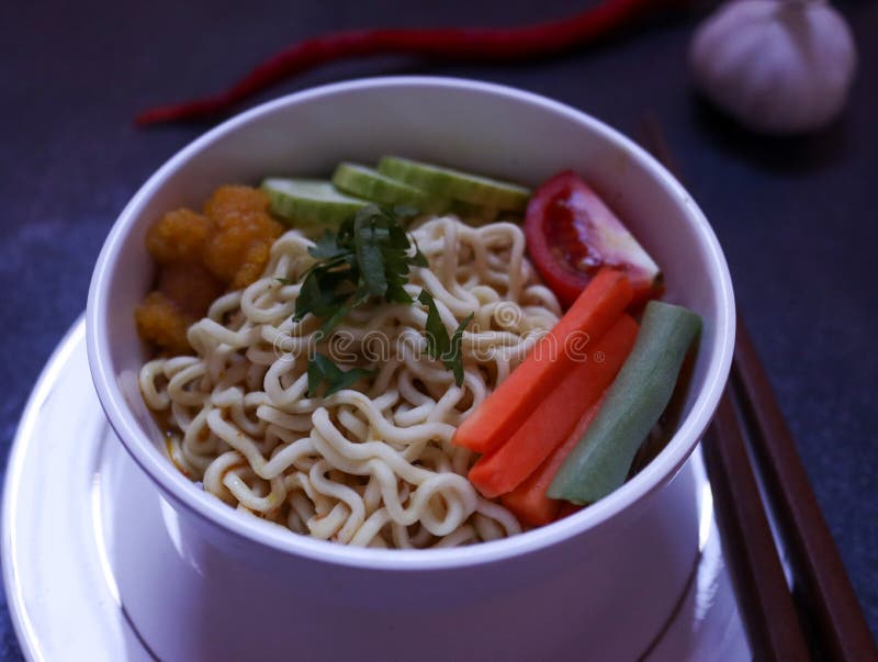 Indomie Special with Fish Eggs and Vegetables Stock Image - Image of ...